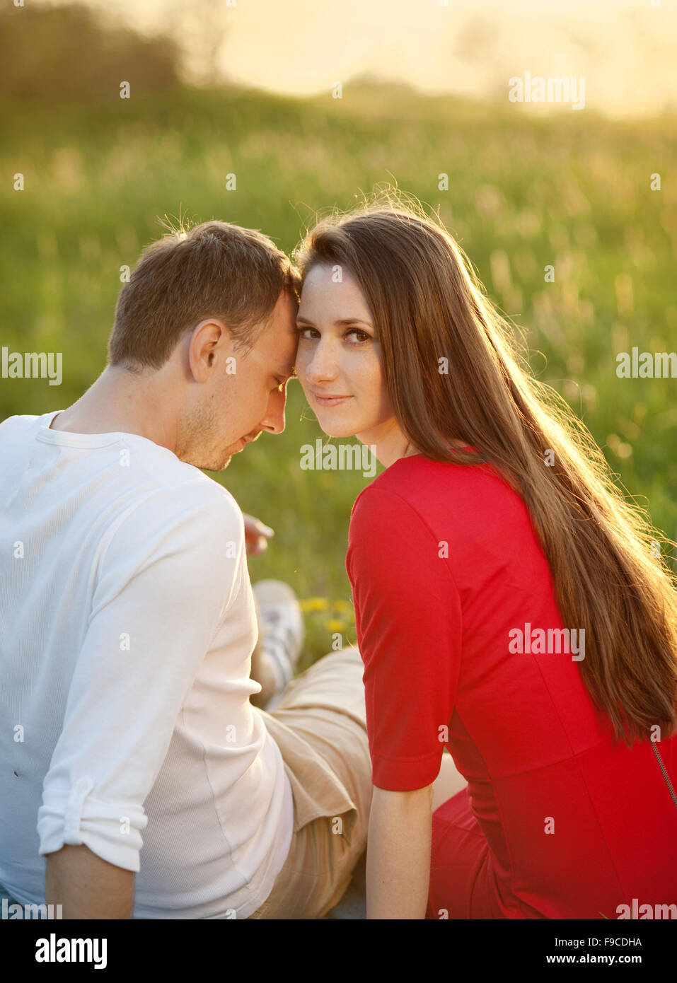 Happy couple is having romantic time in nature Stock Photo - Alamy