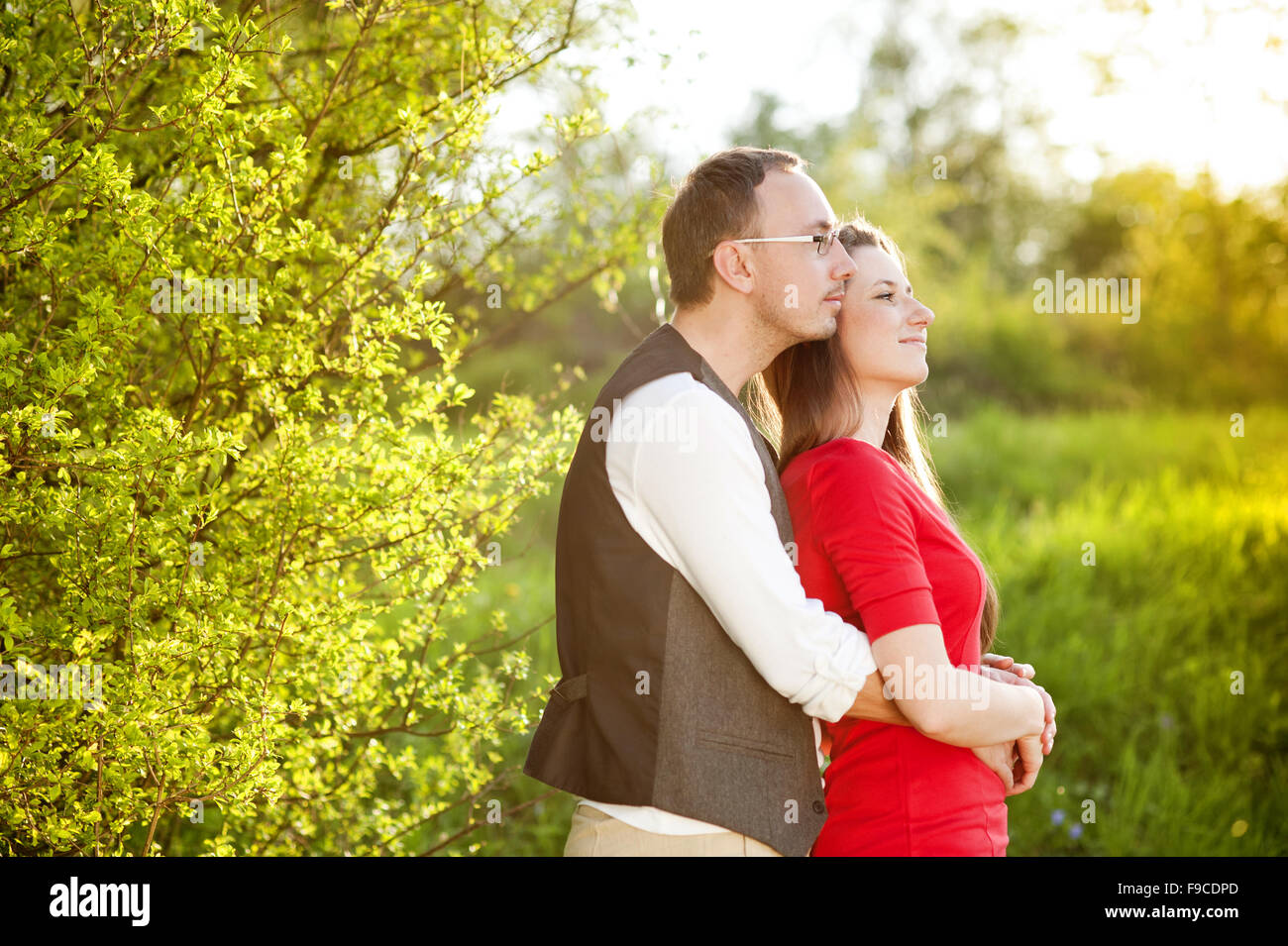 Happy couple is having romantic time in nature Stock Photo - Alamy