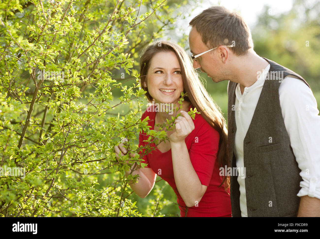 Happy couple is having romantic time in nature Stock Photo - Alamy