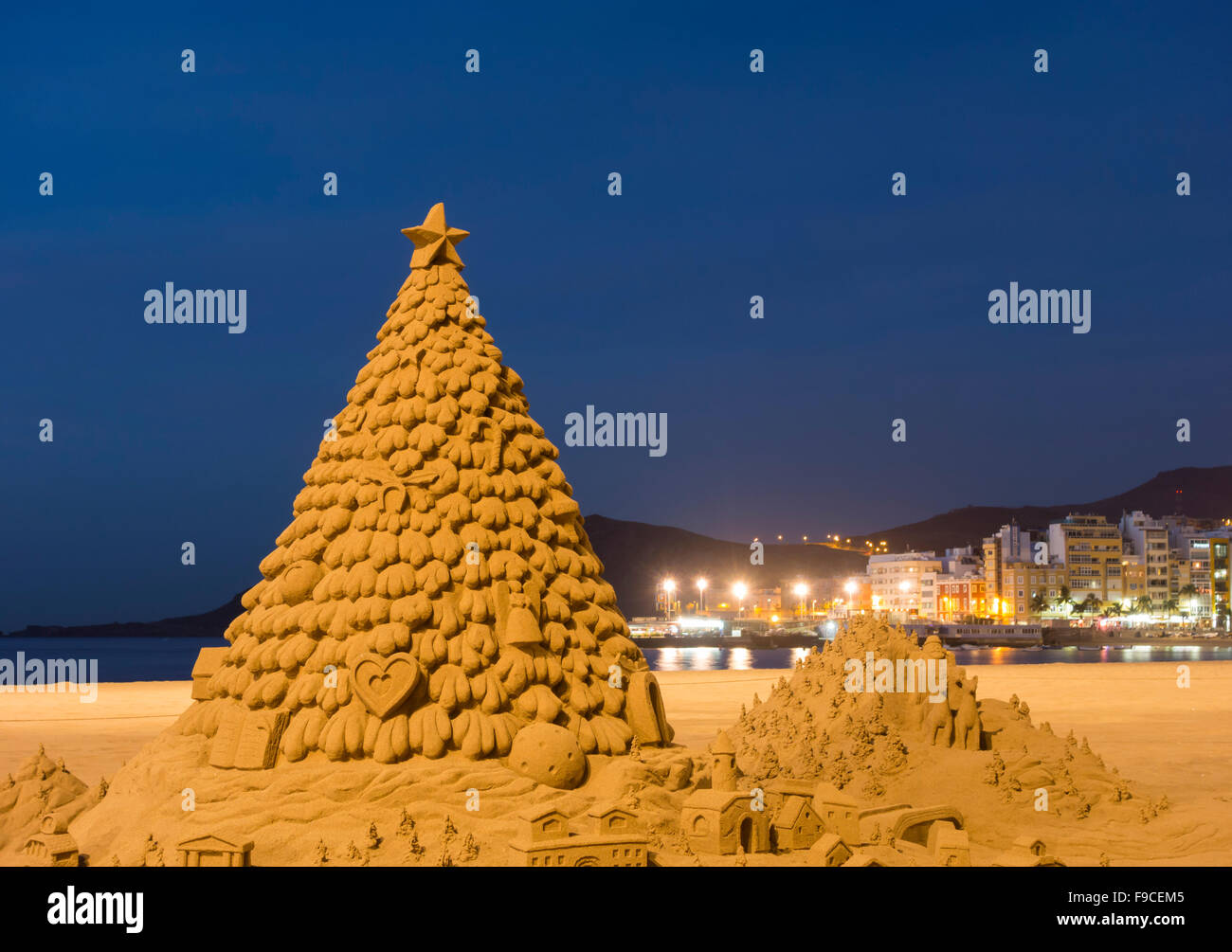 Christmas tree, nativity scene sand sculpture on beach in Spain Stock ...