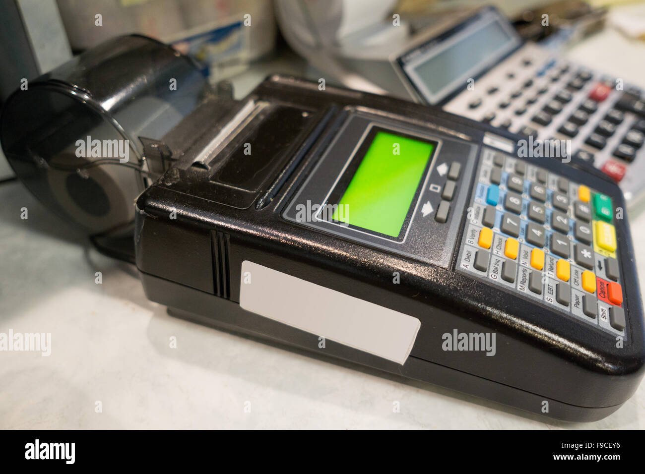 credit card machine reader on a counter of a restarant Stock Photo - Alamy