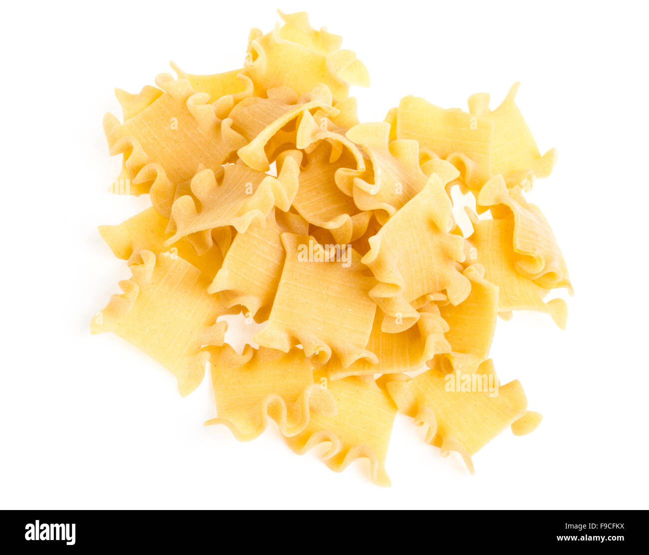 Raw yellow Italian pasta Stock Photo - Alamy