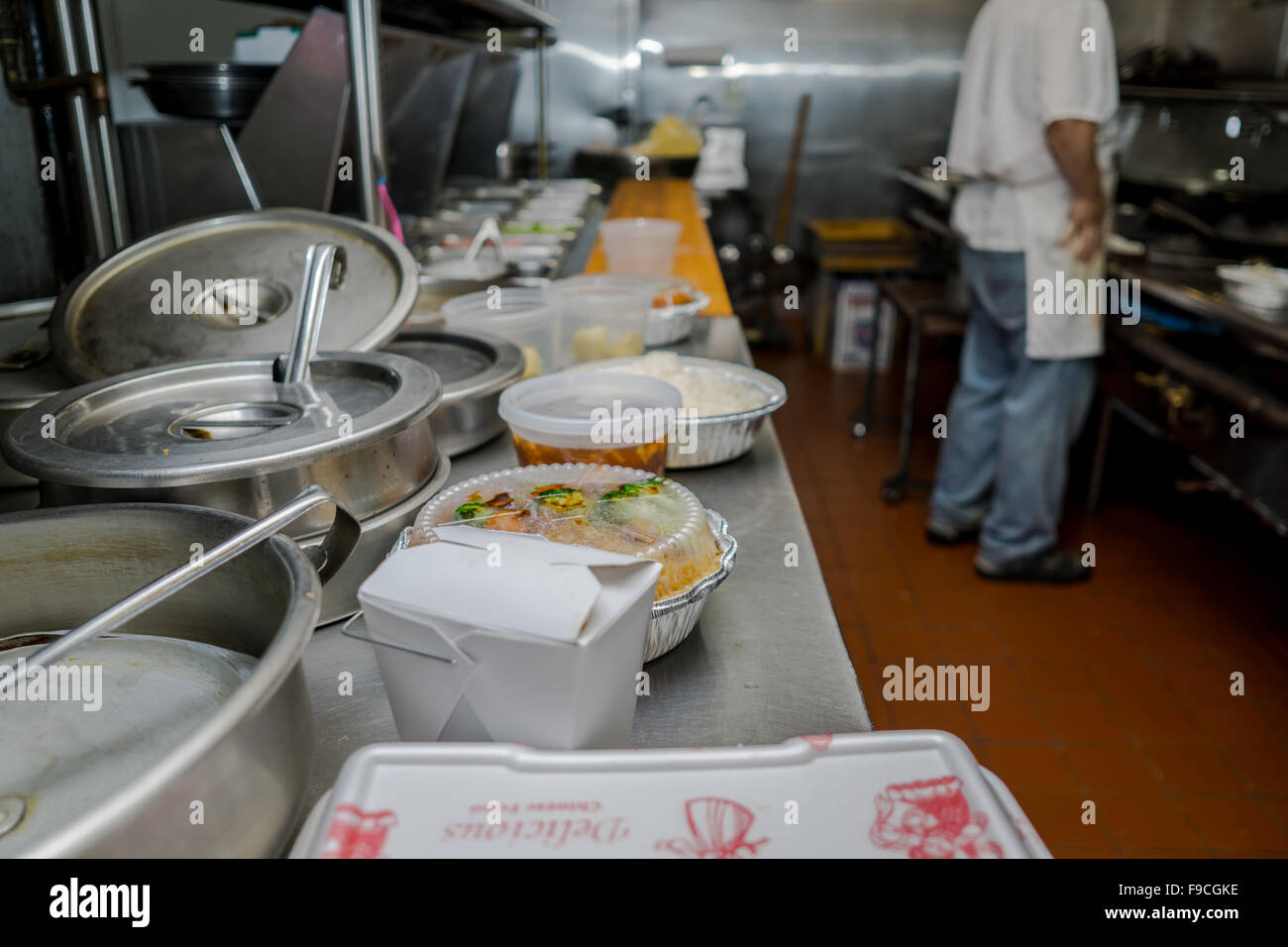 take out orders on the kitchen table ready for delivery Stock Photo - Alamy