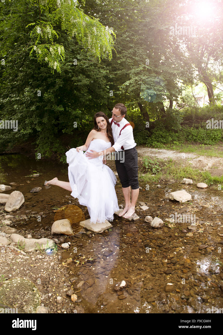 Happy bride and groom on their wedding day Stock Photo - Alamy