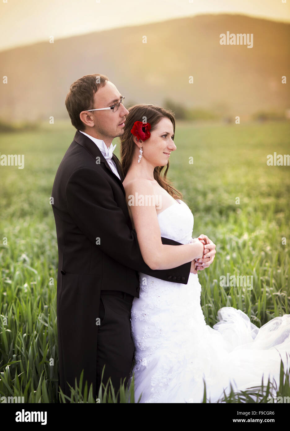 Happy bride and groom on their wedding day Stock Photo - Alamy