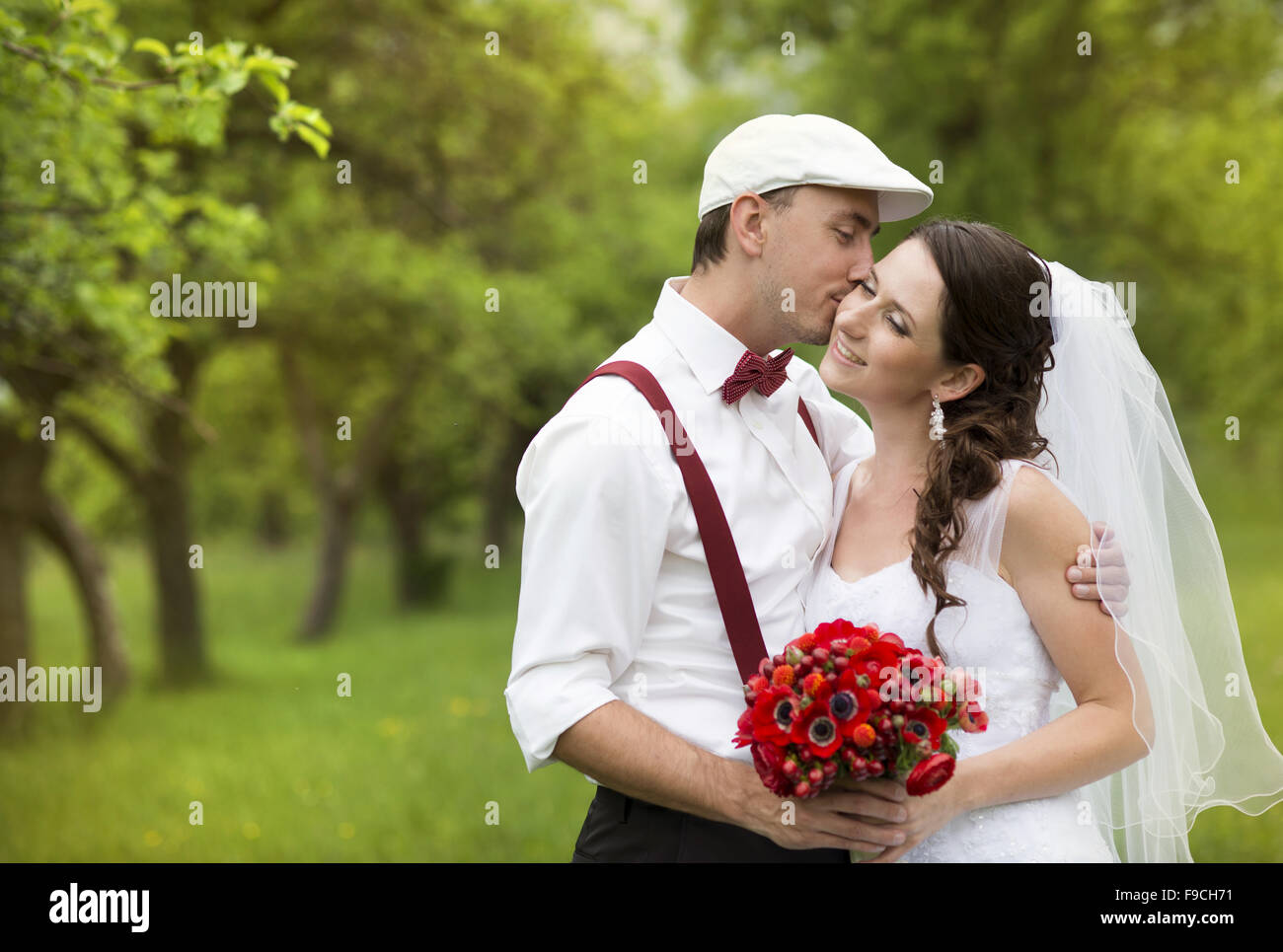 Happy bride and groom on their wedding day Stock Photo - Alamy