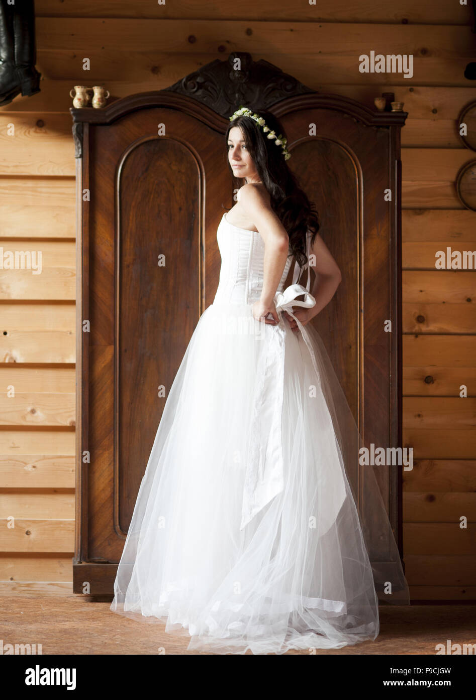Beautiful bride in country style wedding dress Stock Photo - Alamy