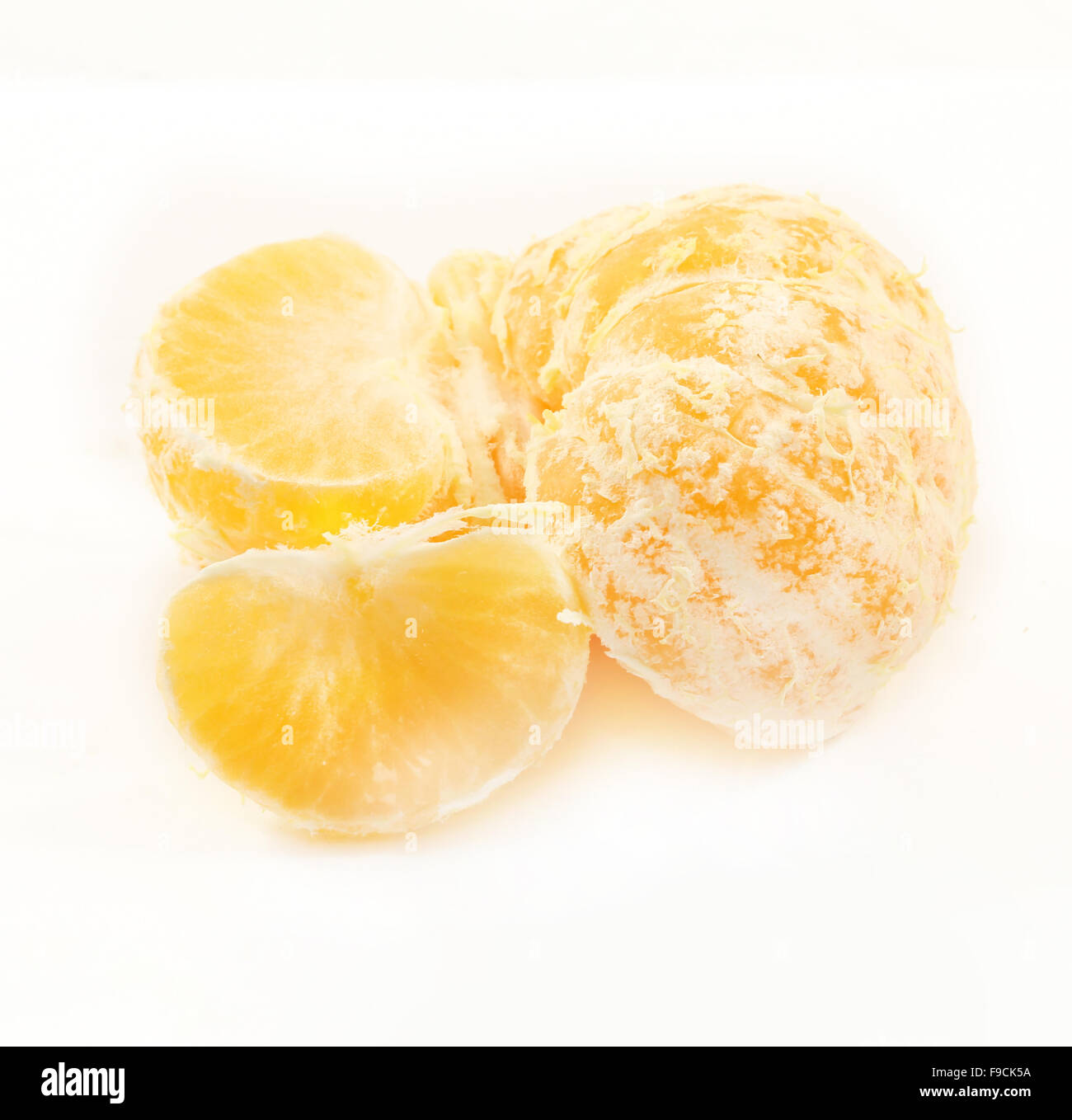 Delicious fruits tangerines photographed closeup on a white background ...