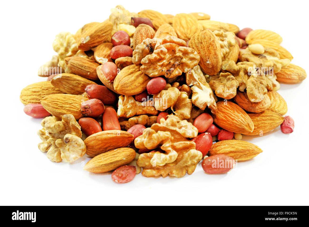 walnut, almond, peanuts and pine nuts photographed near Stock Photo - Alamy