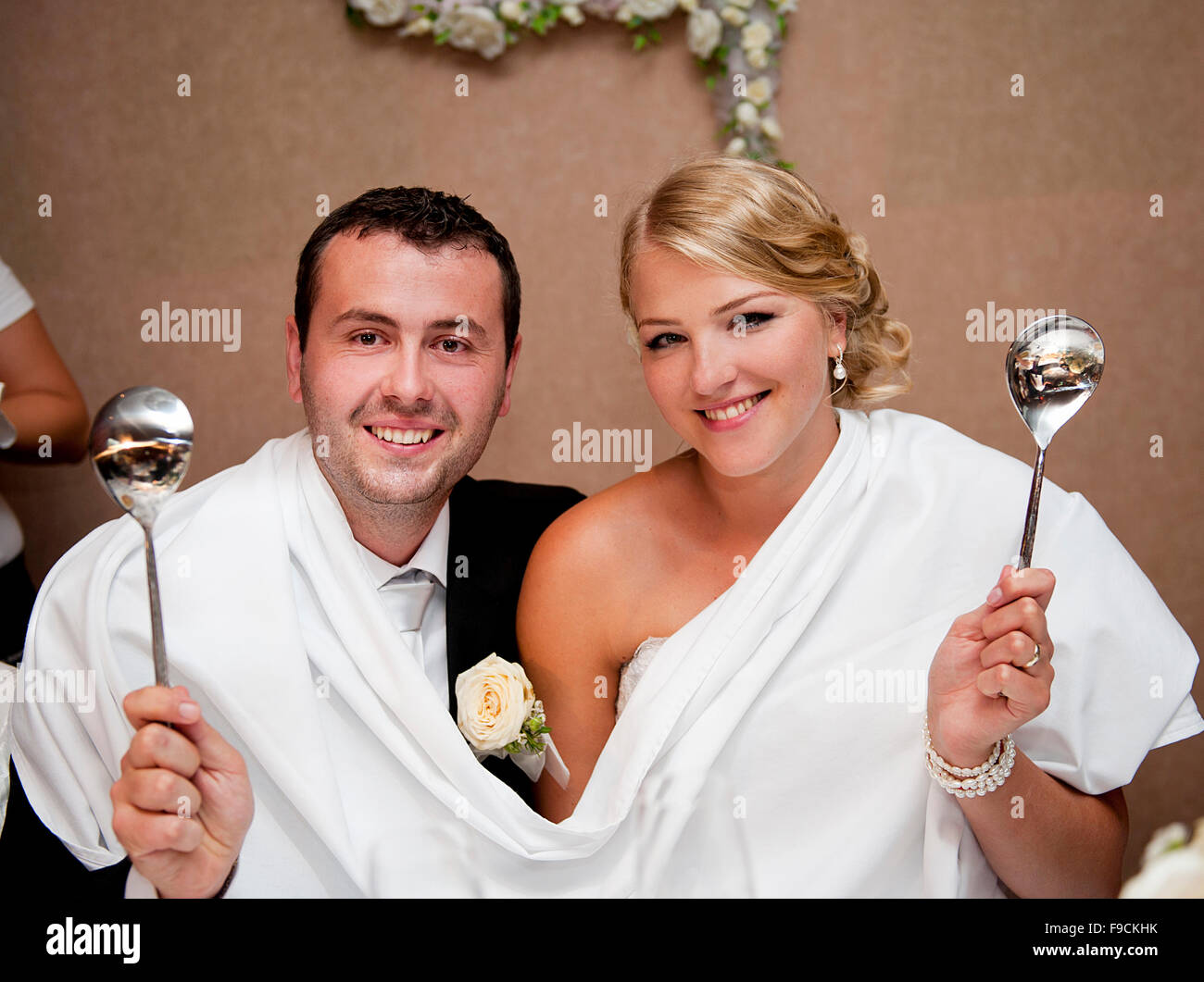 Bride and groom are eating at the wedding reception Stock Photo - Alamy