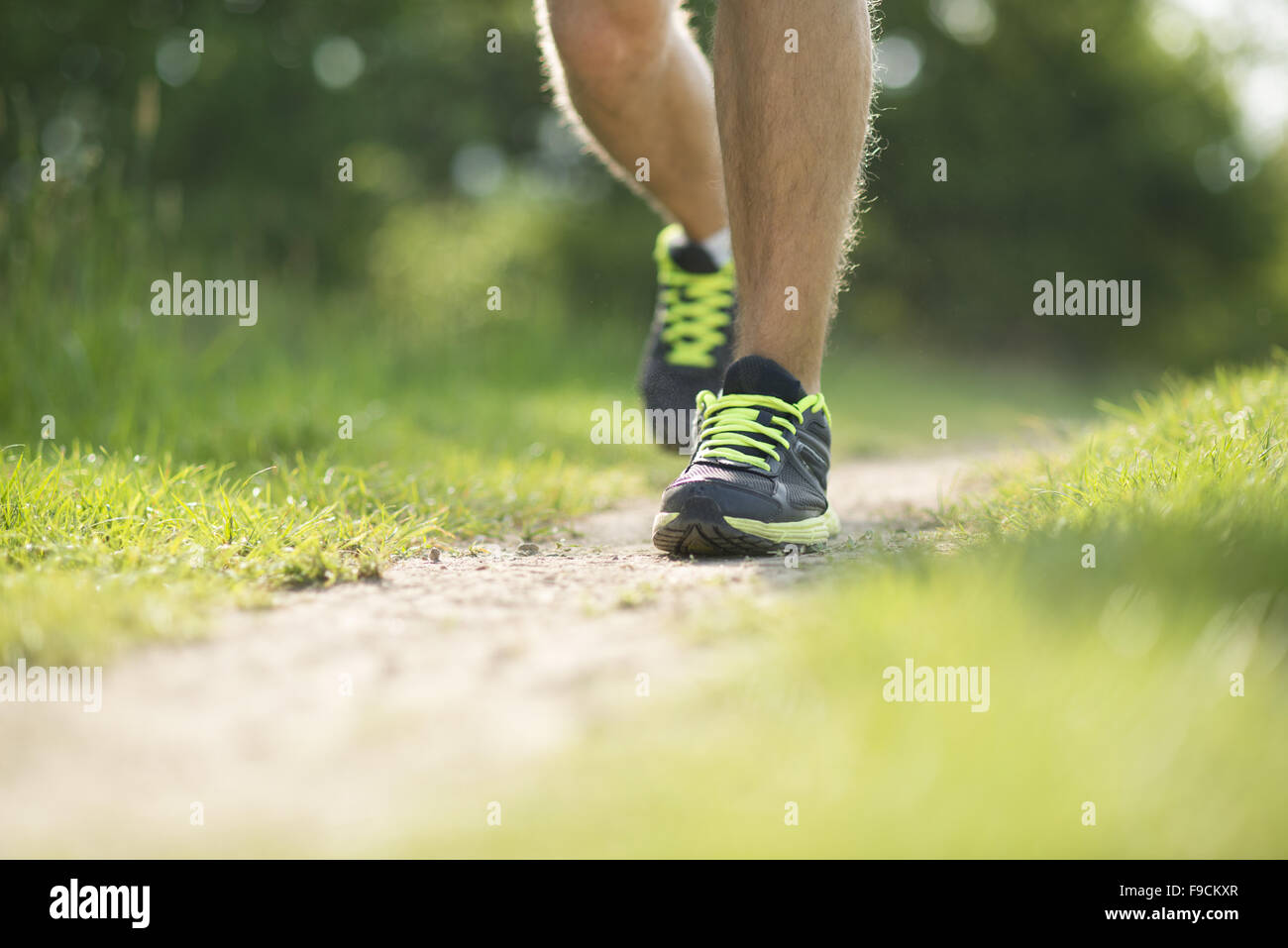 Man running in sunny hi-res stock photography and images - Alamy