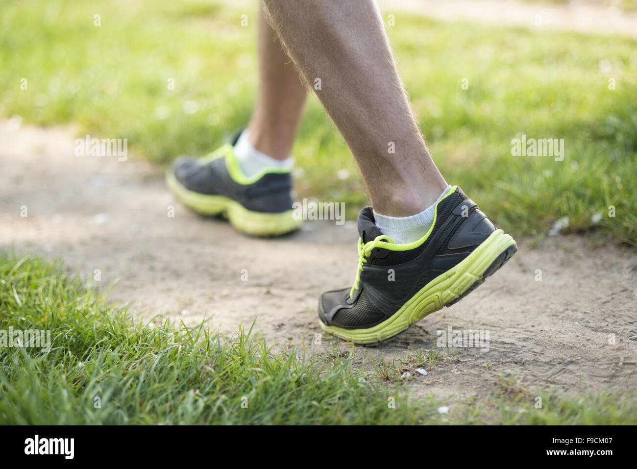 Sporty man running in nature hi-res stock photography and images - Alamy