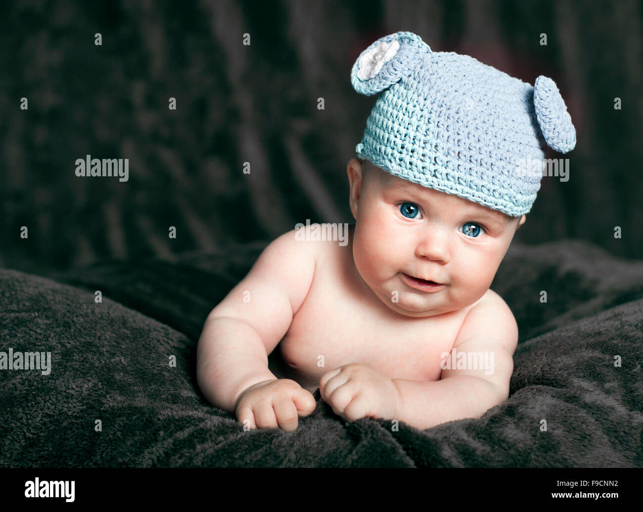 Three months old baby has lot of fun Stock Photo - Alamy