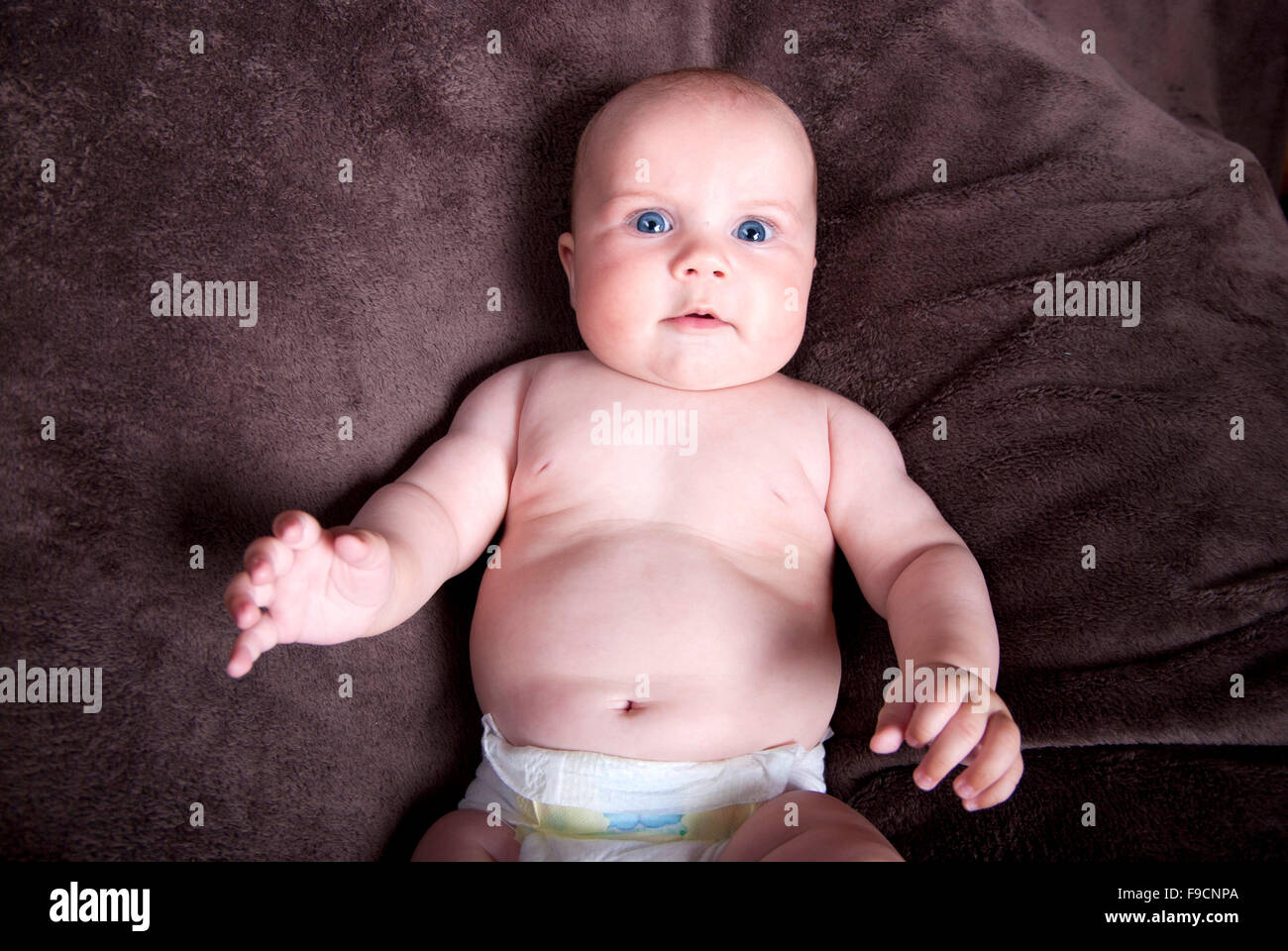 Three months old baby has lot of fun Stock Photo - Alamy