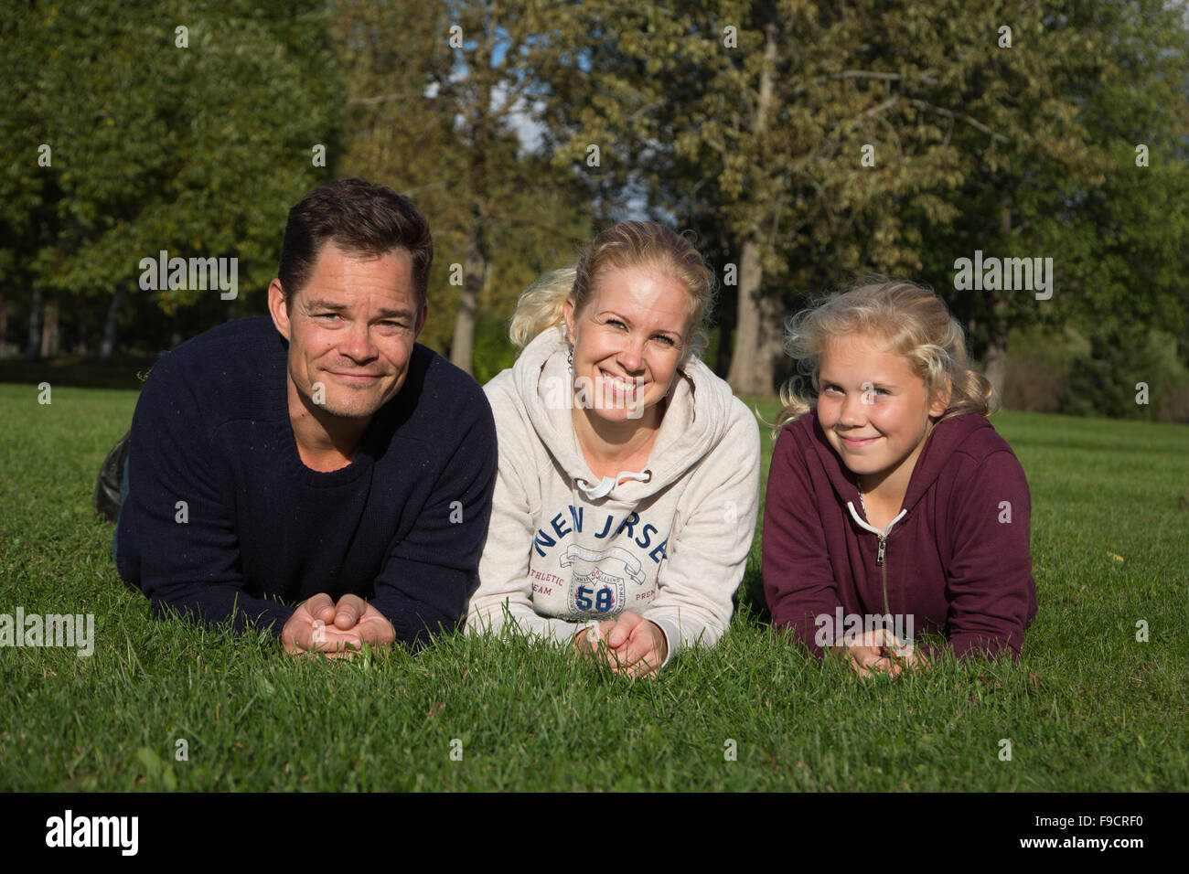 A family having fun together outdoors Stock Photo - Alamy