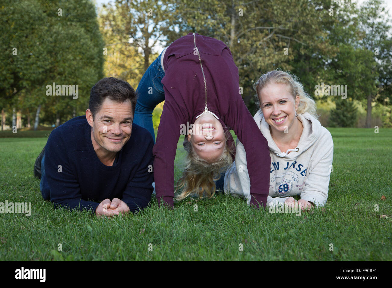 A family having fun together outdoors Stock Photo - Alamy