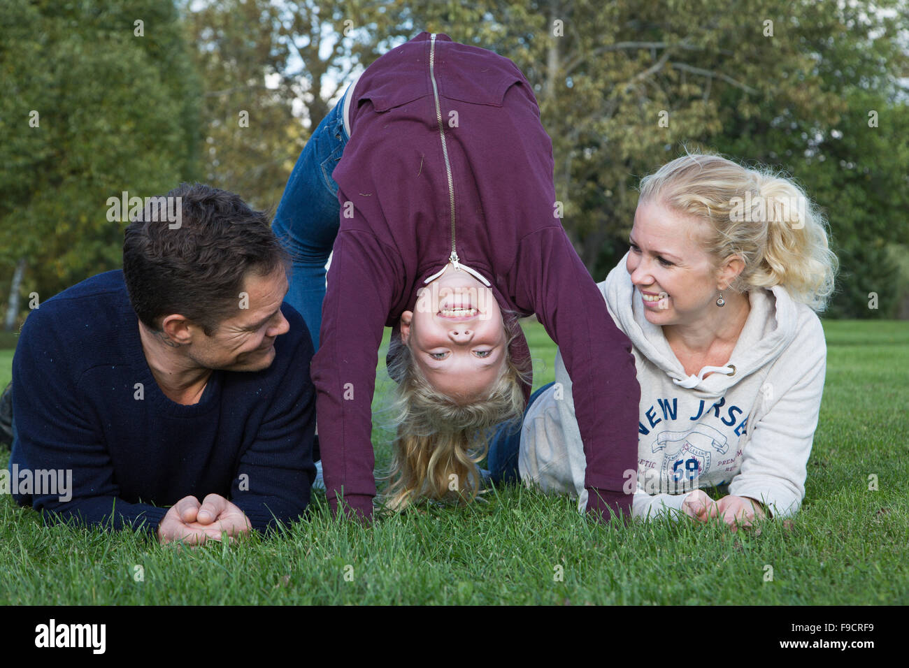 A family having fun together outdoors Stock Photo - Alamy