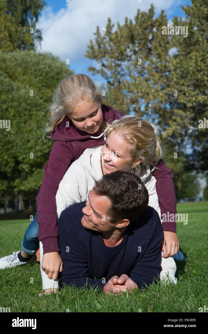 A family having fun together outdoors Stock Photo - Alamy