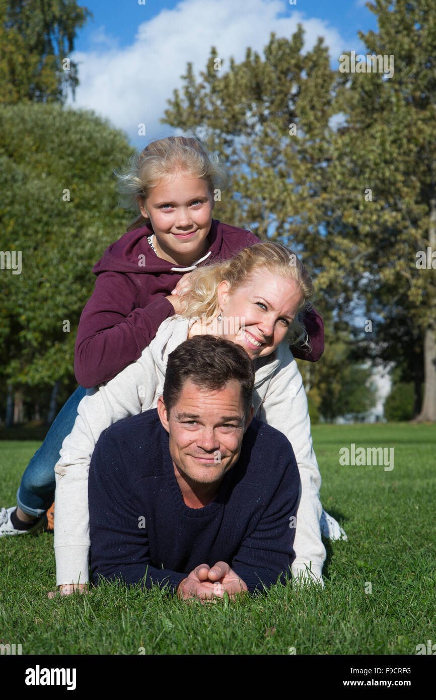 A family having fun together outdoors Stock Photo - Alamy