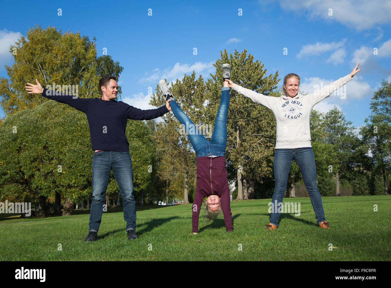 A family having fun together outdoors Stock Photo - Alamy