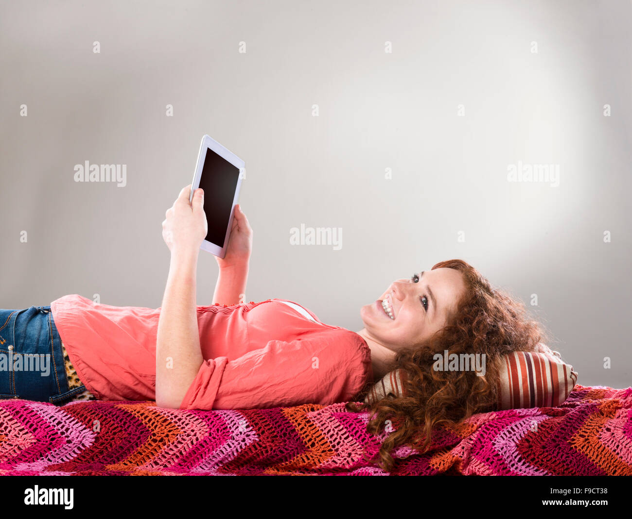 Beautiful girl with tablet is isolated on white background Stock Photo ...