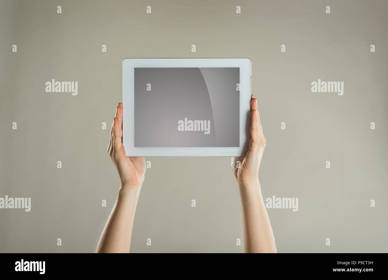 Female hands holding tablet hi-res stock photography and images - Alamy