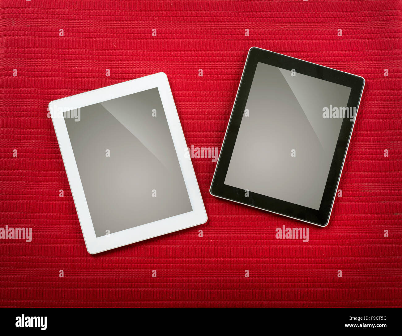Tablet with isolated screen on red carpet Stock Photo - Alamy