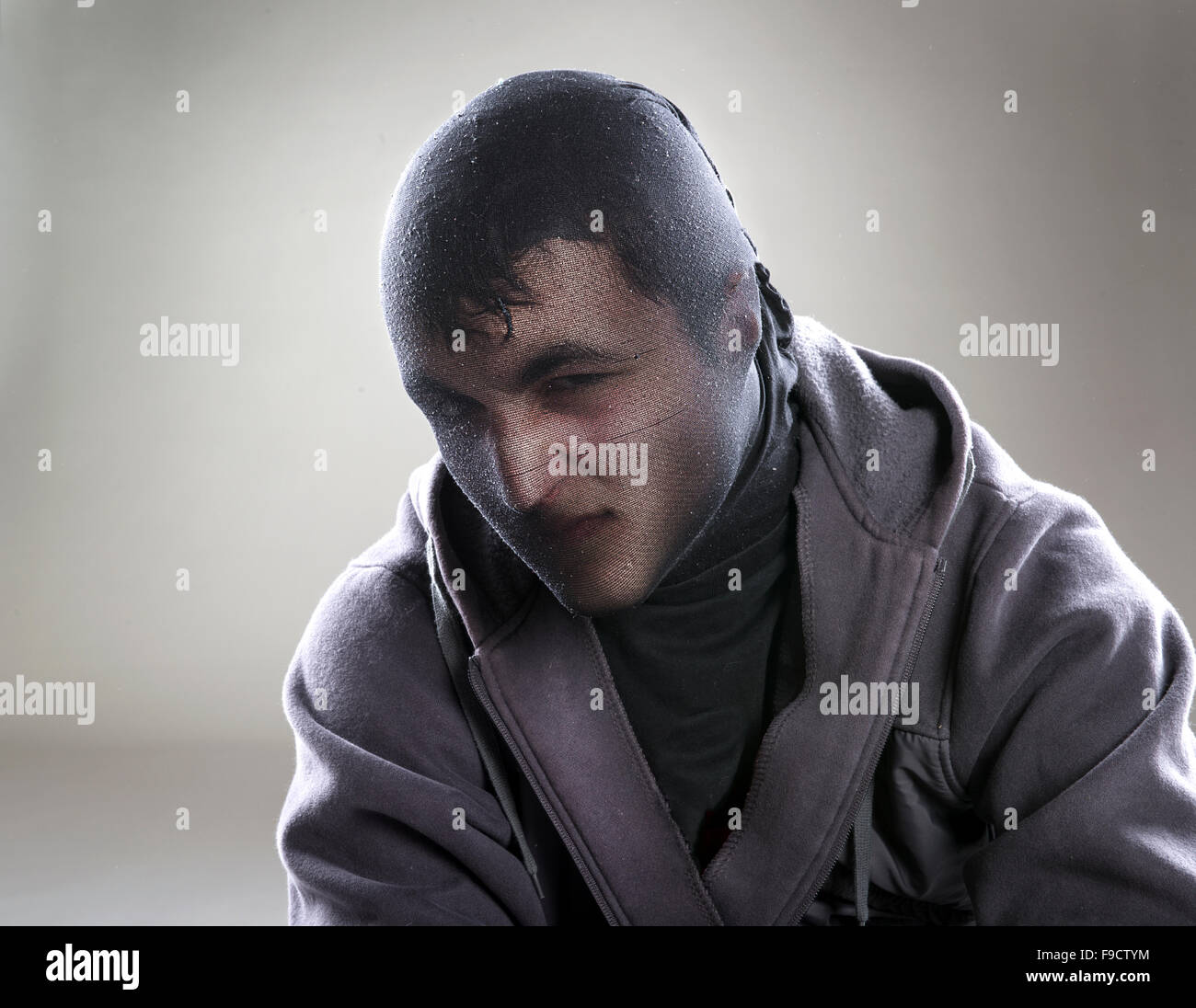 Angry hooligan in black mask hi-res stock photography and images - Alamy
