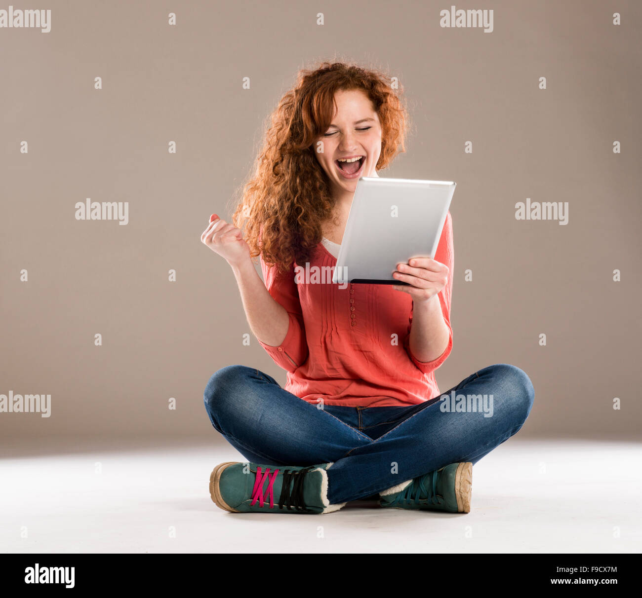 Beautiful girl with tablet is isolated on white background Stock Photo ...