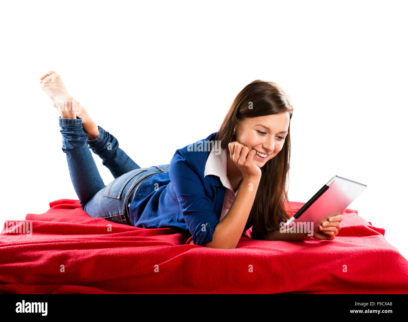 Beautiful girl with tablet is isolated in her room Stock Photo - Alamy