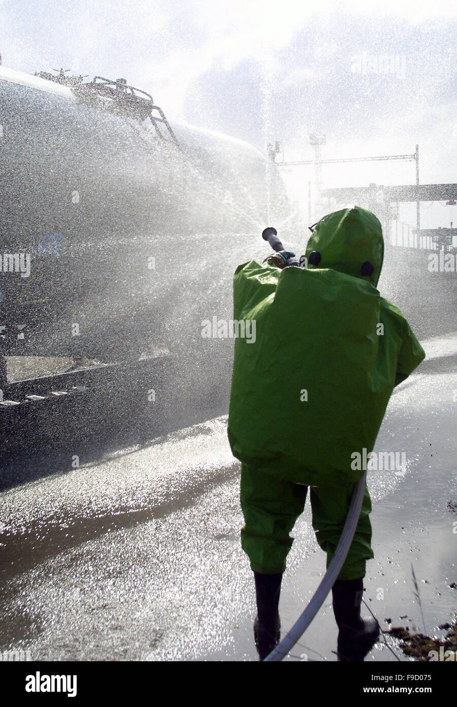 Fireman in Action Stock Photo - Alamy