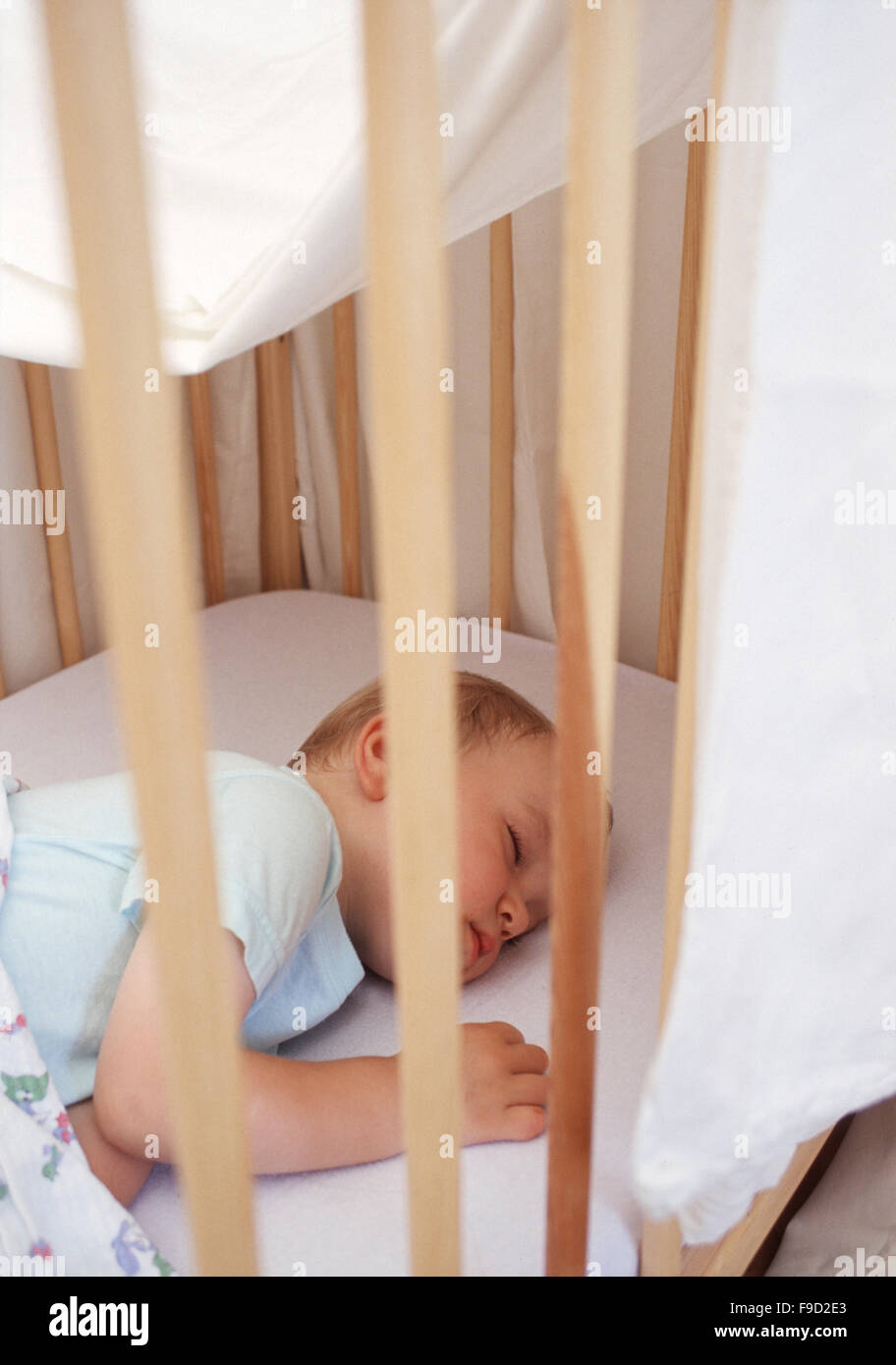 Lies at cot hi-res stock photography and images - Alamy