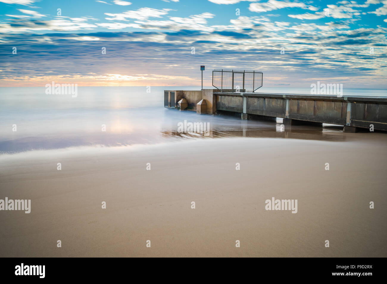 Soft sunrise over Australian beach Stock Photo - Alamy