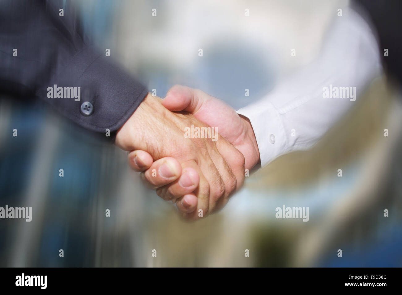 Two Men Shaking Hands Stock Photo - Alamy