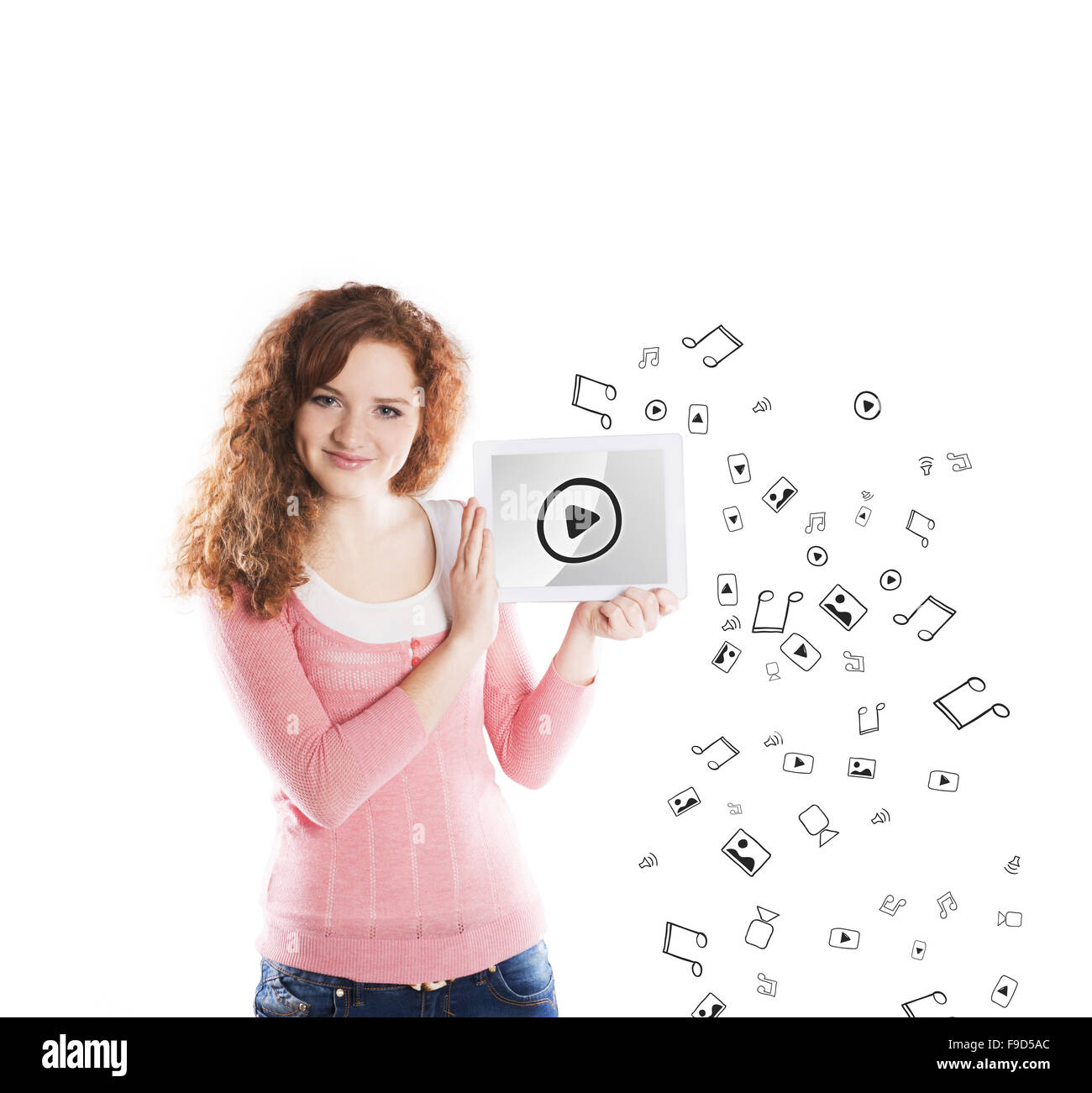 Beautiful young girl with tablet is using social media Stock Photo - Alamy