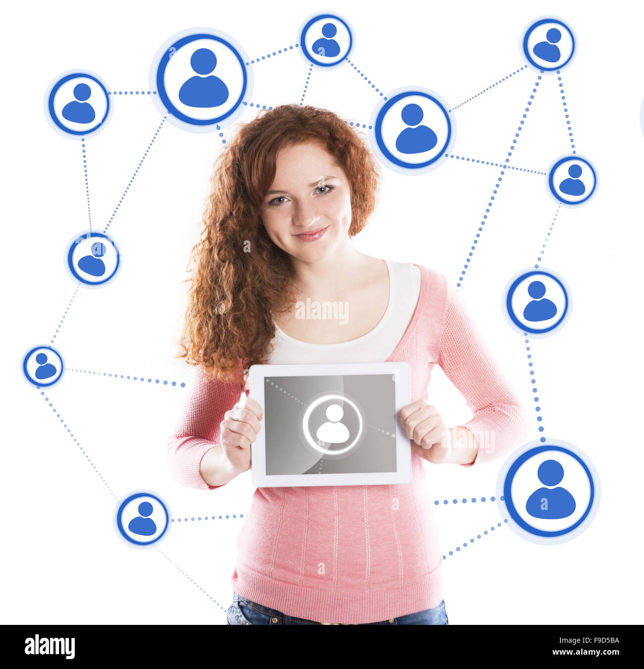 Beautiful young girl with tablet is using social media Stock Photo - Alamy