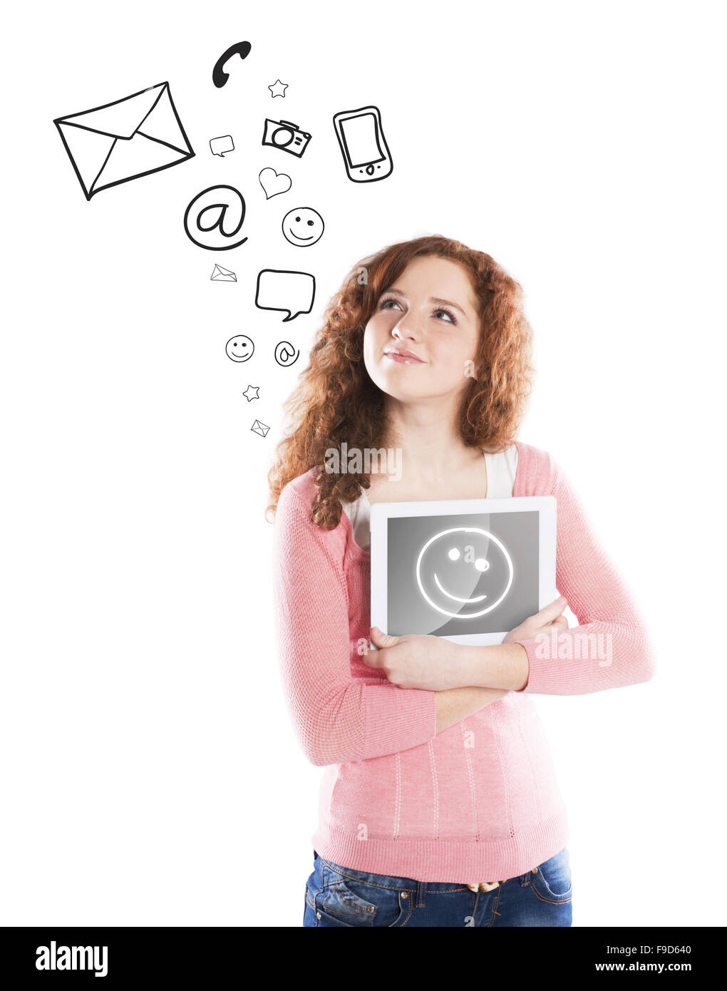 Beautiful young girl with tablet is using social media Stock Photo - Alamy