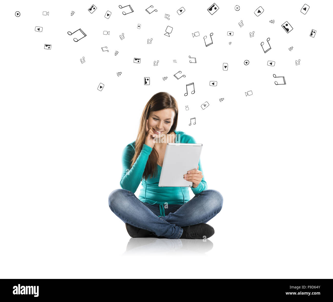 Beautiful young girl with tablet is using social media Stock Photo - Alamy