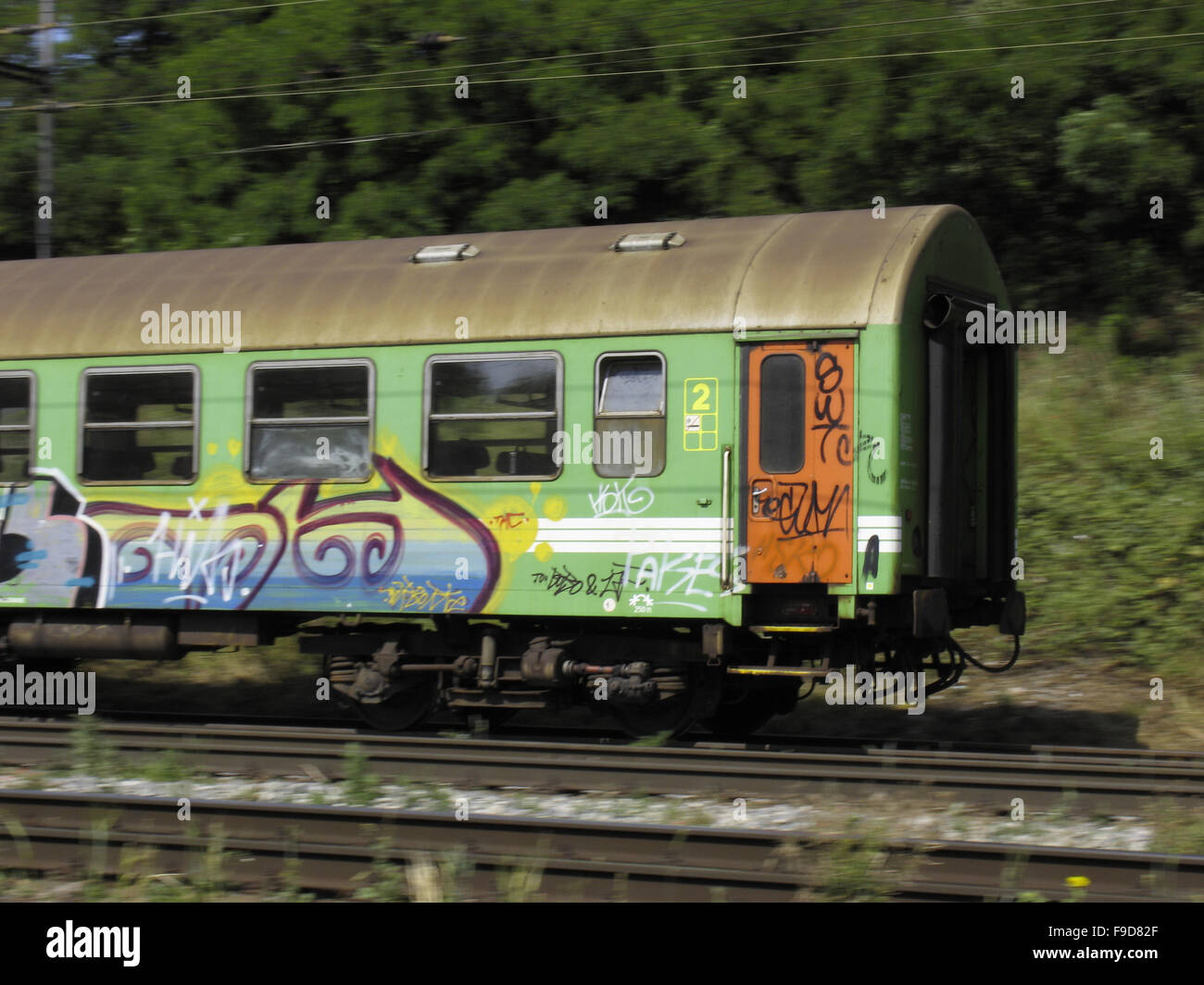 Coach with graffiti Stock Photo - Alamy