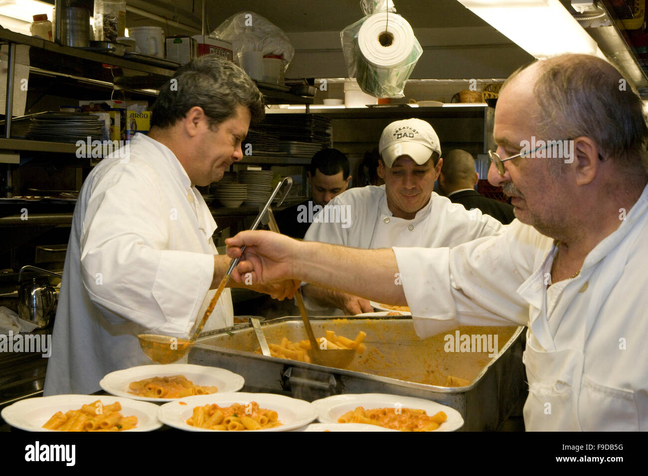Restaurant kitchen serving pasta Stock Photo - Alamy