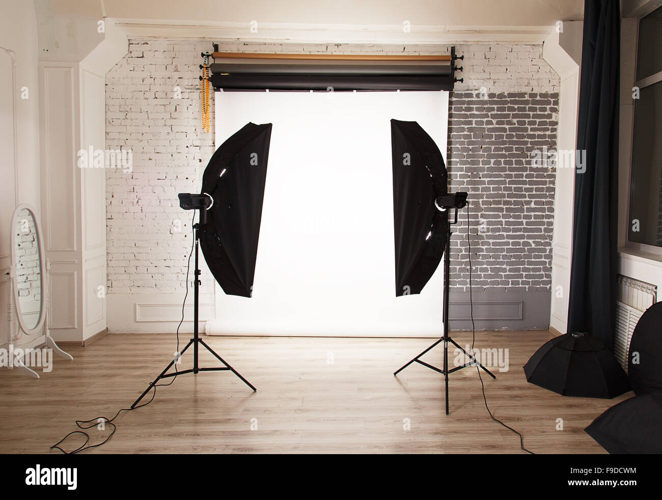 Empty photo studio interior with white background and lighting ...