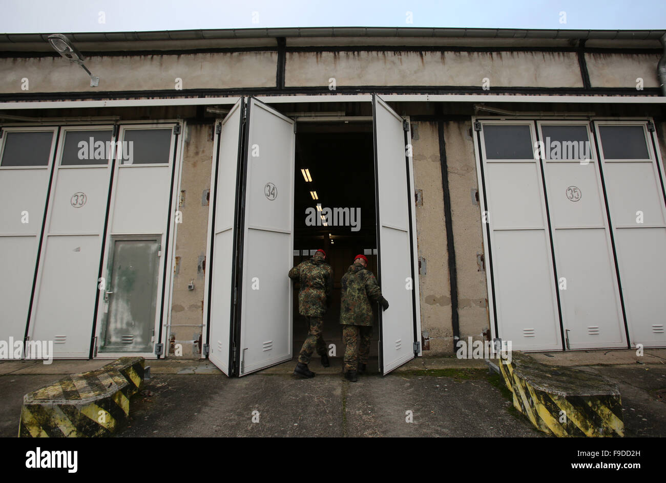 The doors of an empty warehouse are closed after the last materials ...