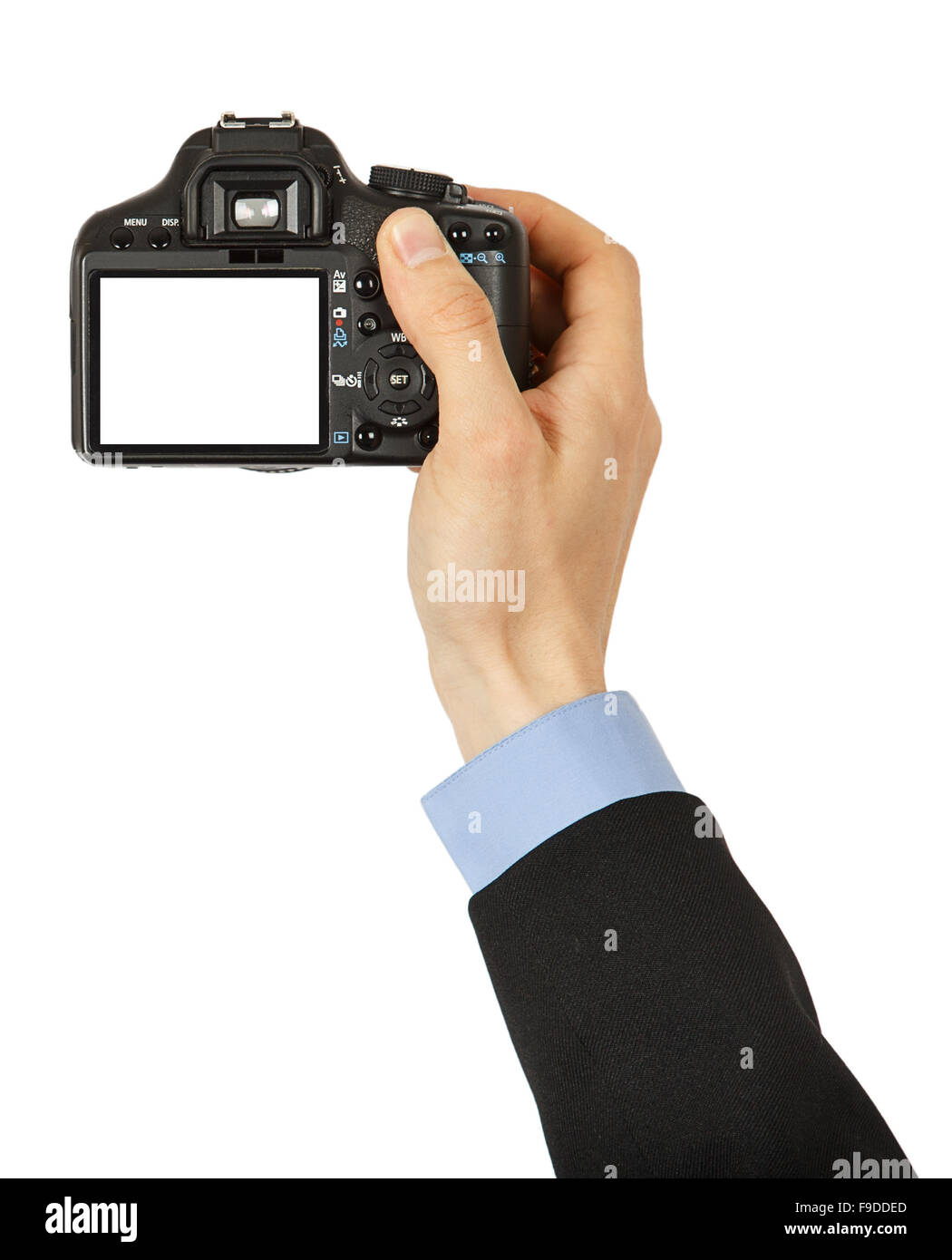 Black photo camera with clipping path for the screen in a man's hand ...