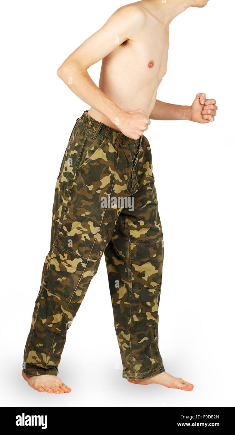 Man in military pants running isolated on white background Stock Photo ...