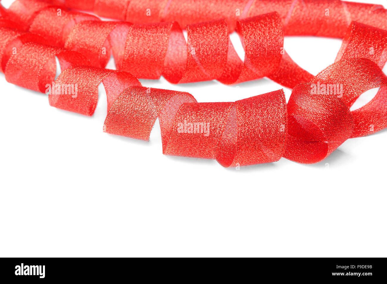 Red ribbon twisted spiral Stock Photo - Alamy