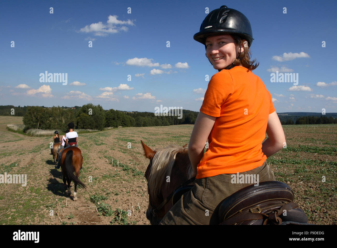 Happy horse riders hi-res stock photography and images - Alamy