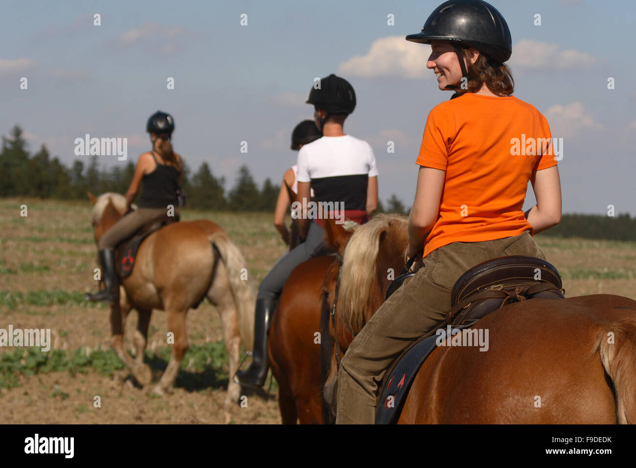 Happy horse riders hi-res stock photography and images - Alamy