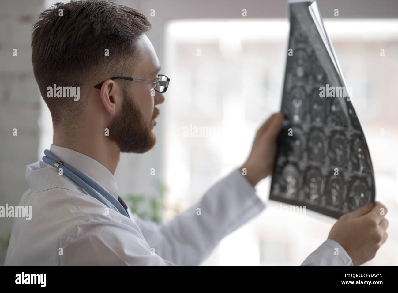 Closeup portrait of intellectual man healthcare personnel with white ...