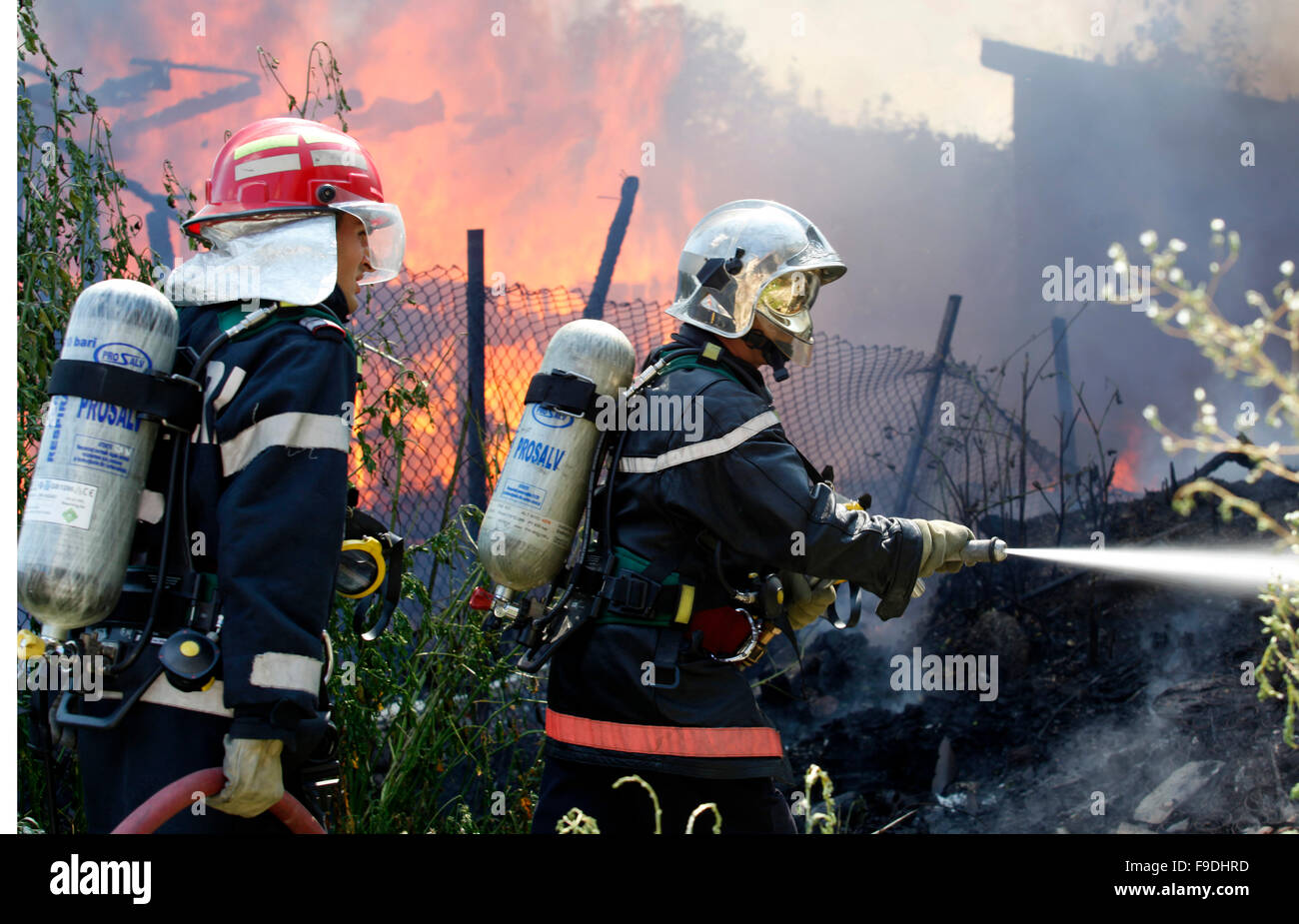 Old building in full flaming Stock Photo - Alamy