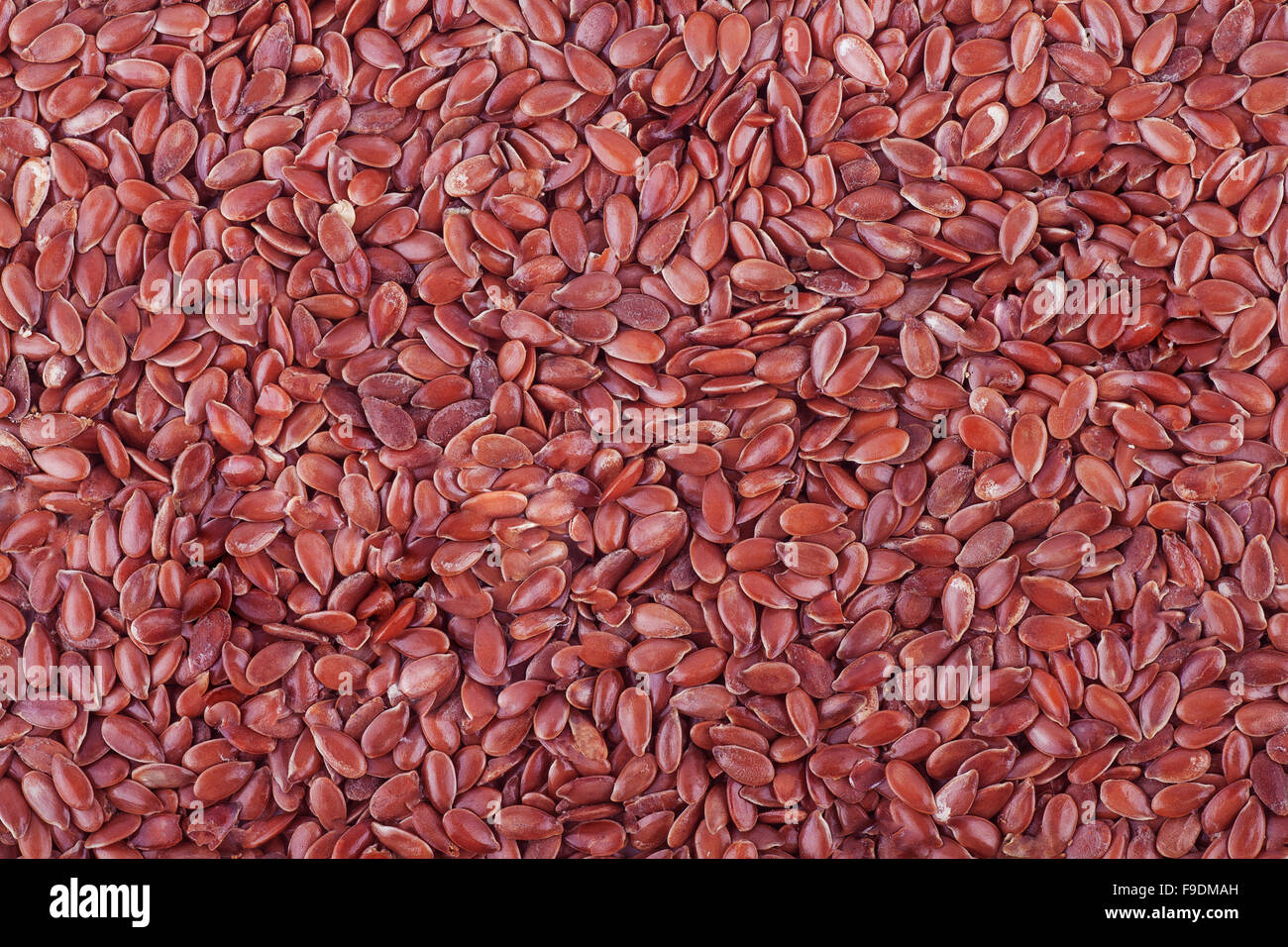 group of brown organic flax seeds background Stock Photo - Alamy